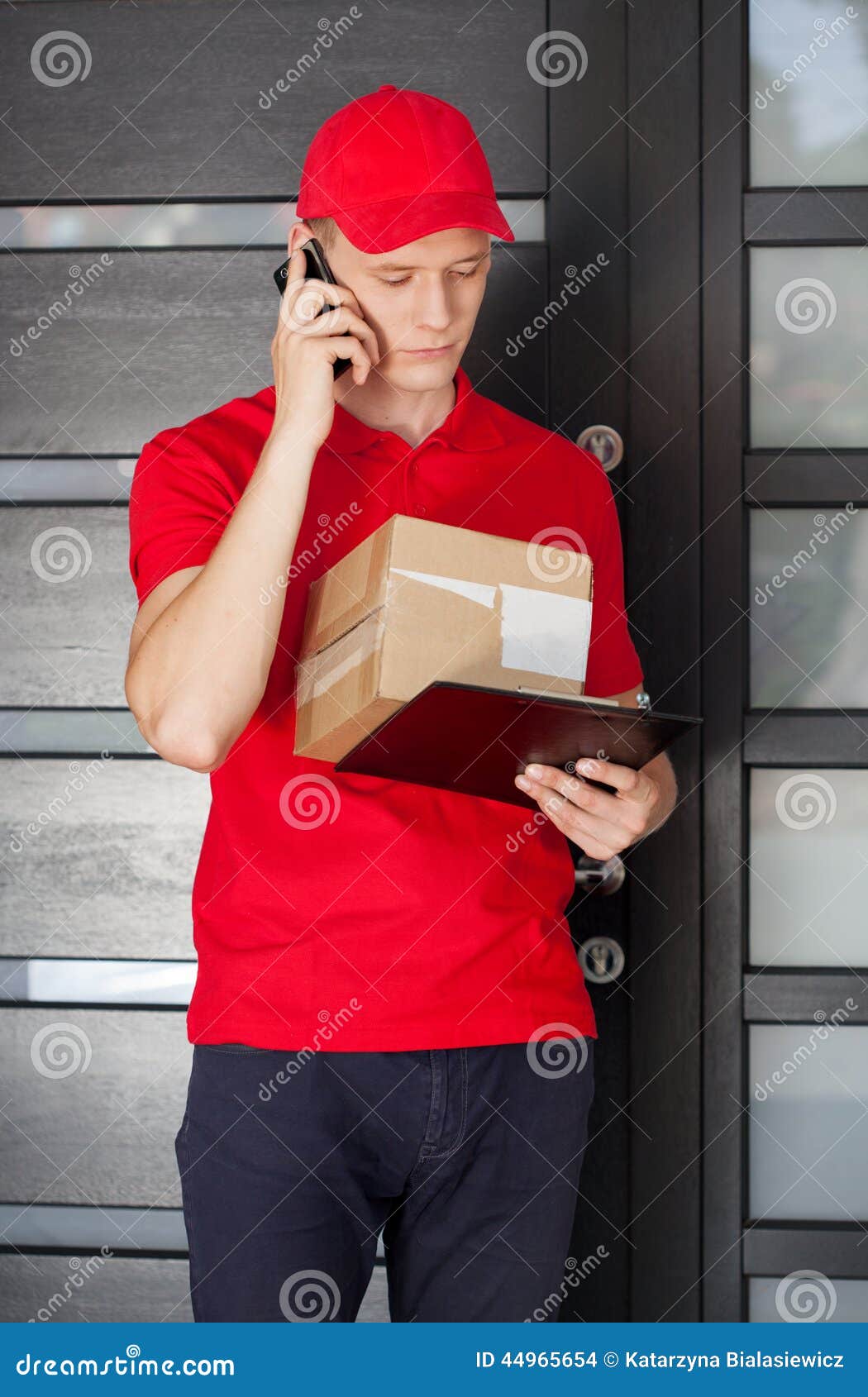 Delivery Man Calling His Client Stock Photo - Image of people, package ...