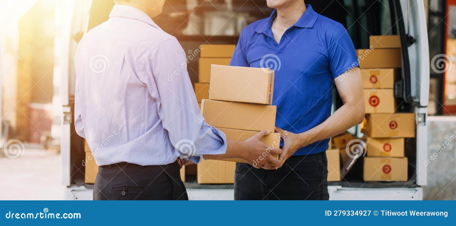 Delivery Man with Cardboard Box Checking Document List in Van and ...