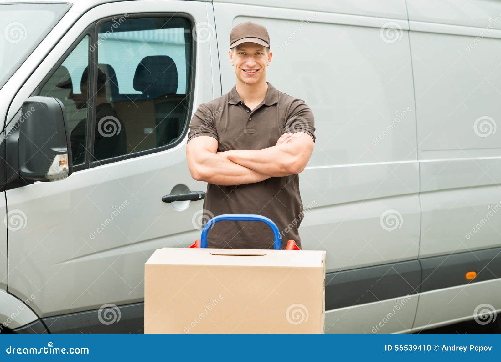 Delivery Man with Cardboard Boxes on Trolley Stock Photo - Image of ...