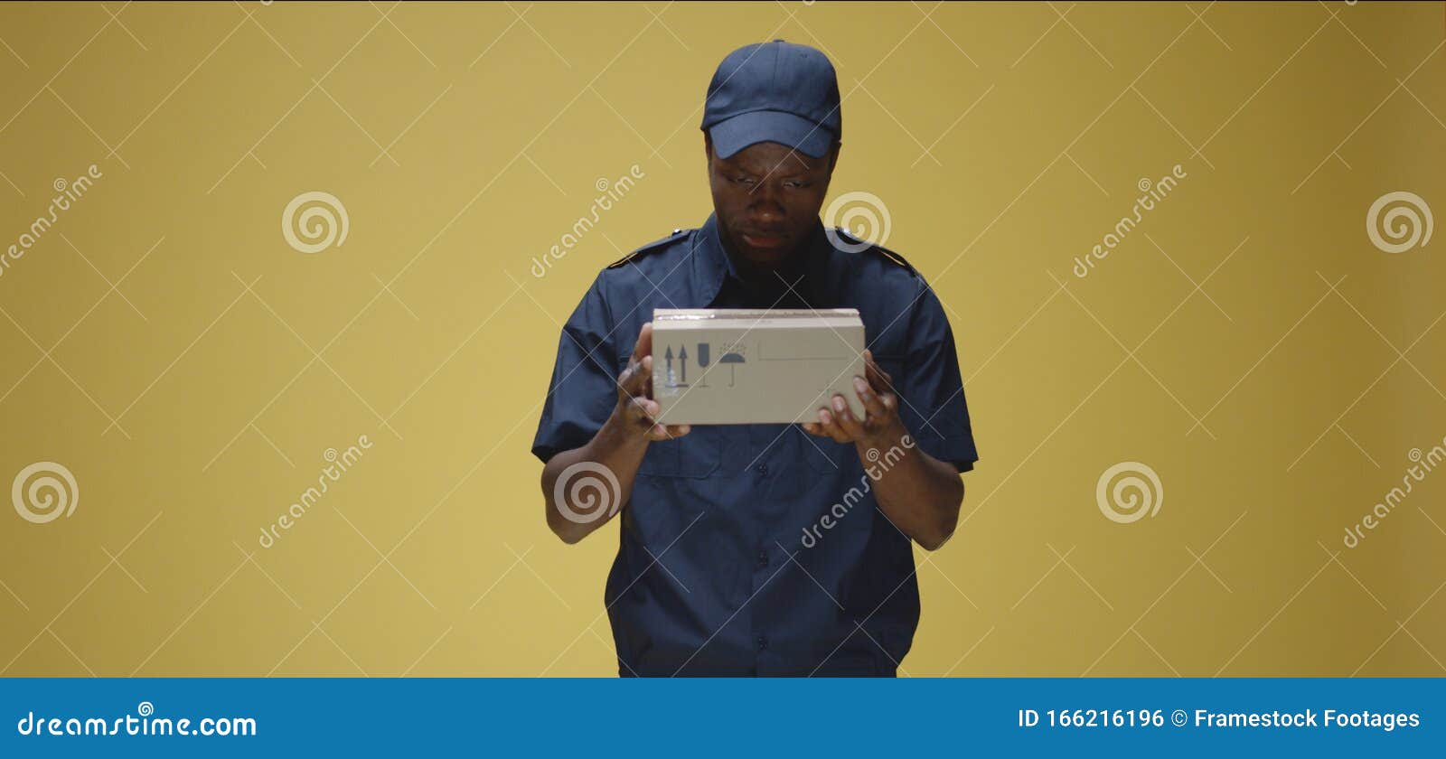 Delivery Man Checking Package Stock Photo - Image of profession ...
