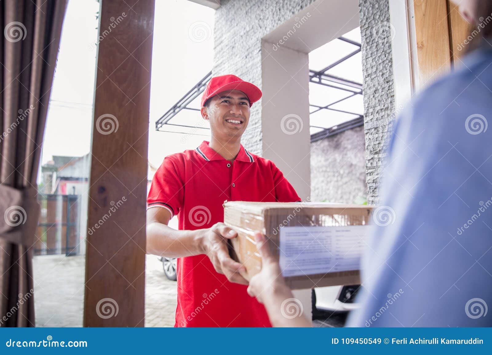 Delivery Man Delivering Box Stock Image - Image of delivering, door ...