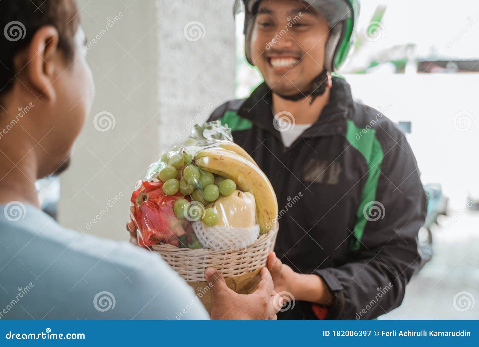 Delivery Man Delivering Fruit Parcel Stock Image - Image of ojek ...
