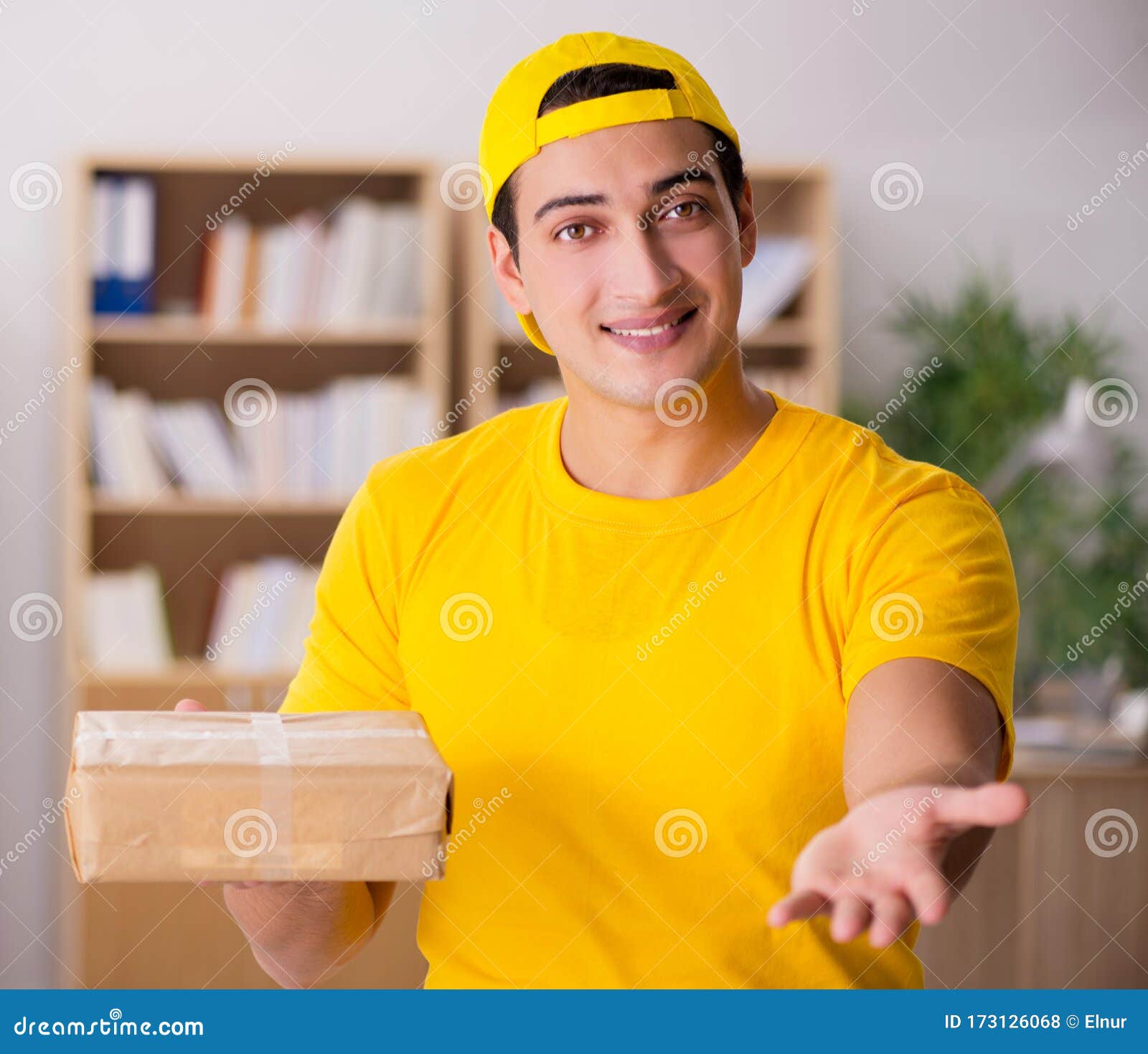 Delivery Man Delivering Parcel Box Stock Photo - Image of house ...