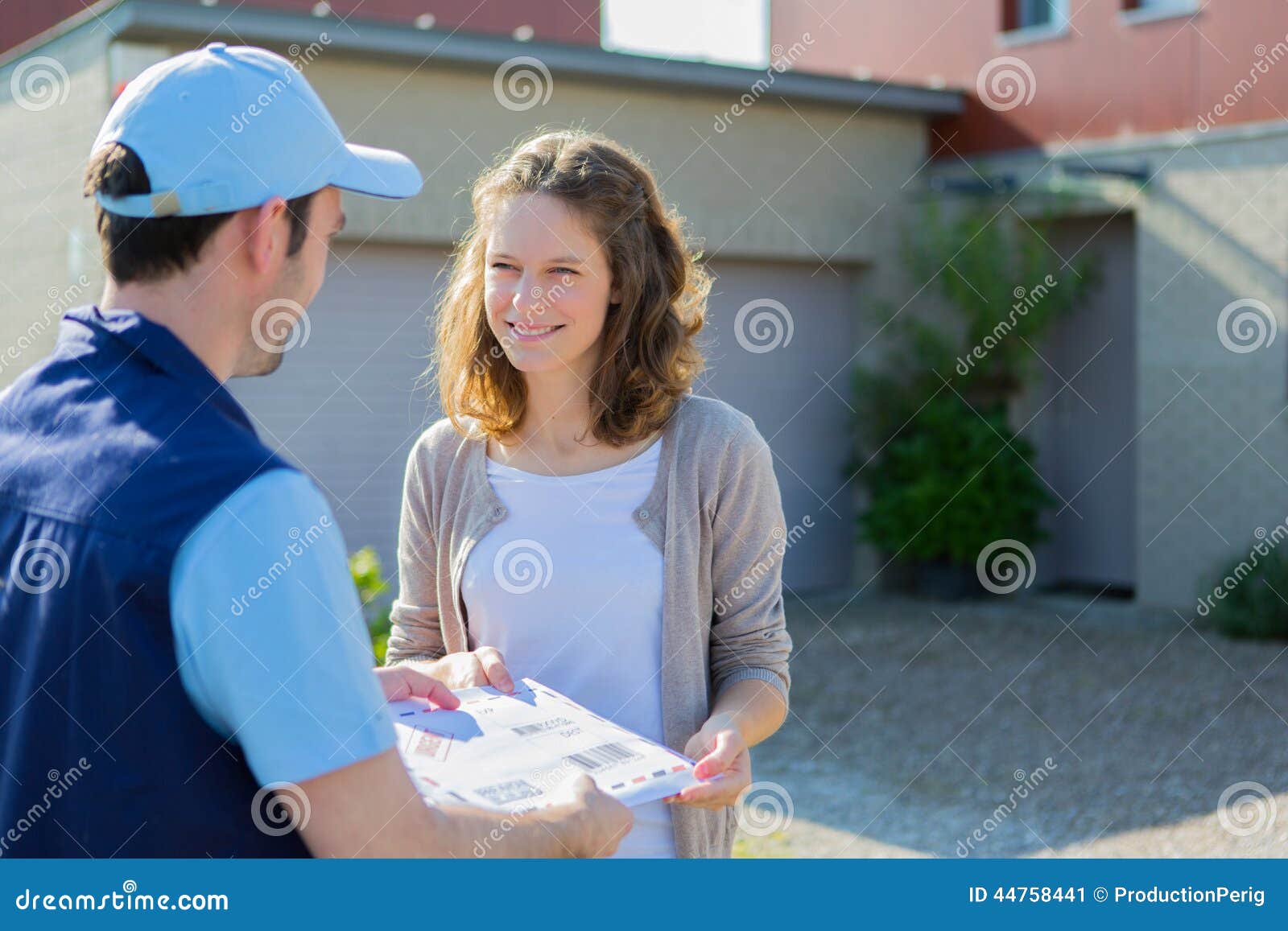 Delivery Man Handing Over a Registered Letter Stock Image - Image of ...