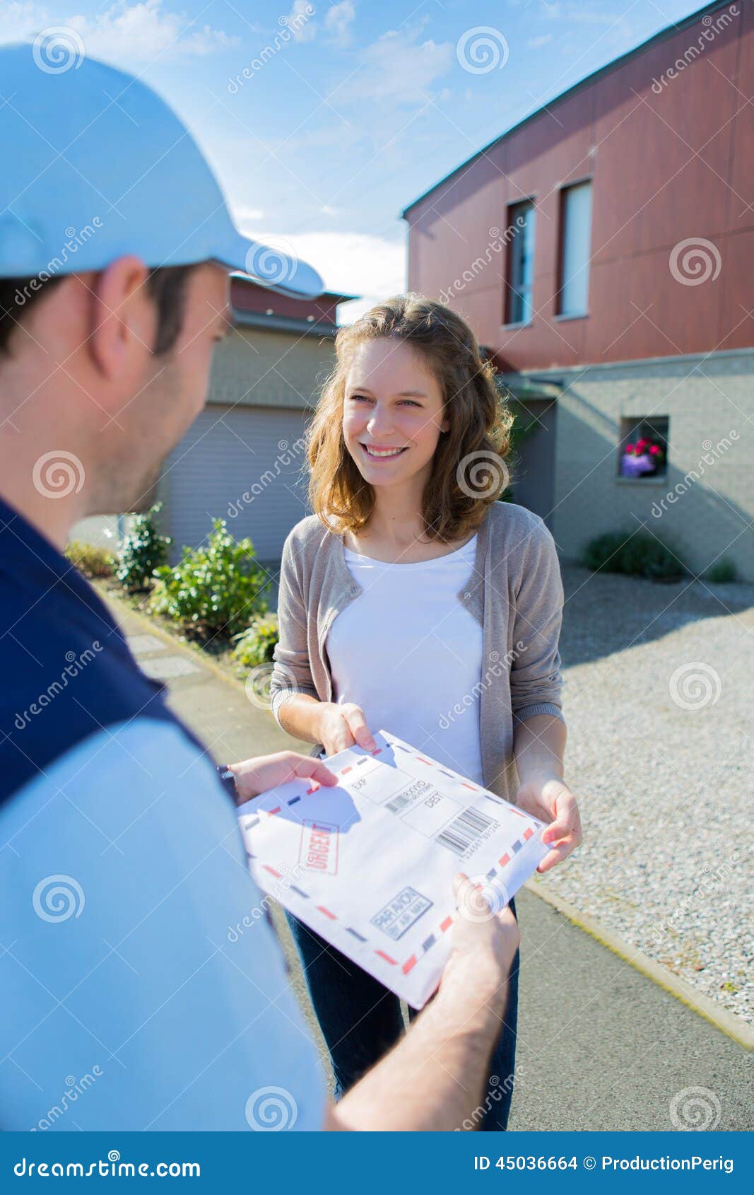 Delivery Man Handing Over a Registered Letter Stock Photo - Image of ...