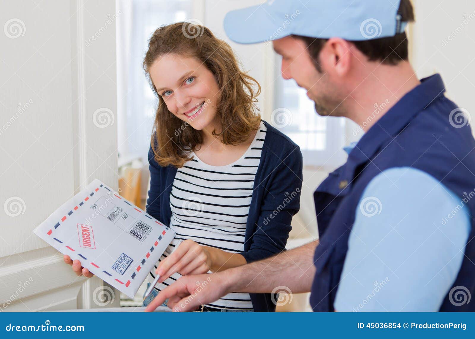 Delivery Man Handing Over a Registered Mail Stock Photo - Image of ...