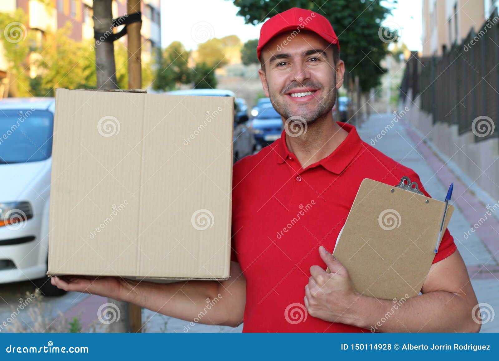 Delivery Man Holding a Box Outdoors Stock Photo - Image of good, latino ...