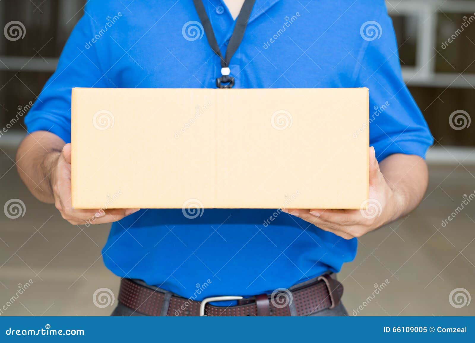 Delivery Man Holding a Parcel Box Stock Image - Image of order, post ...
