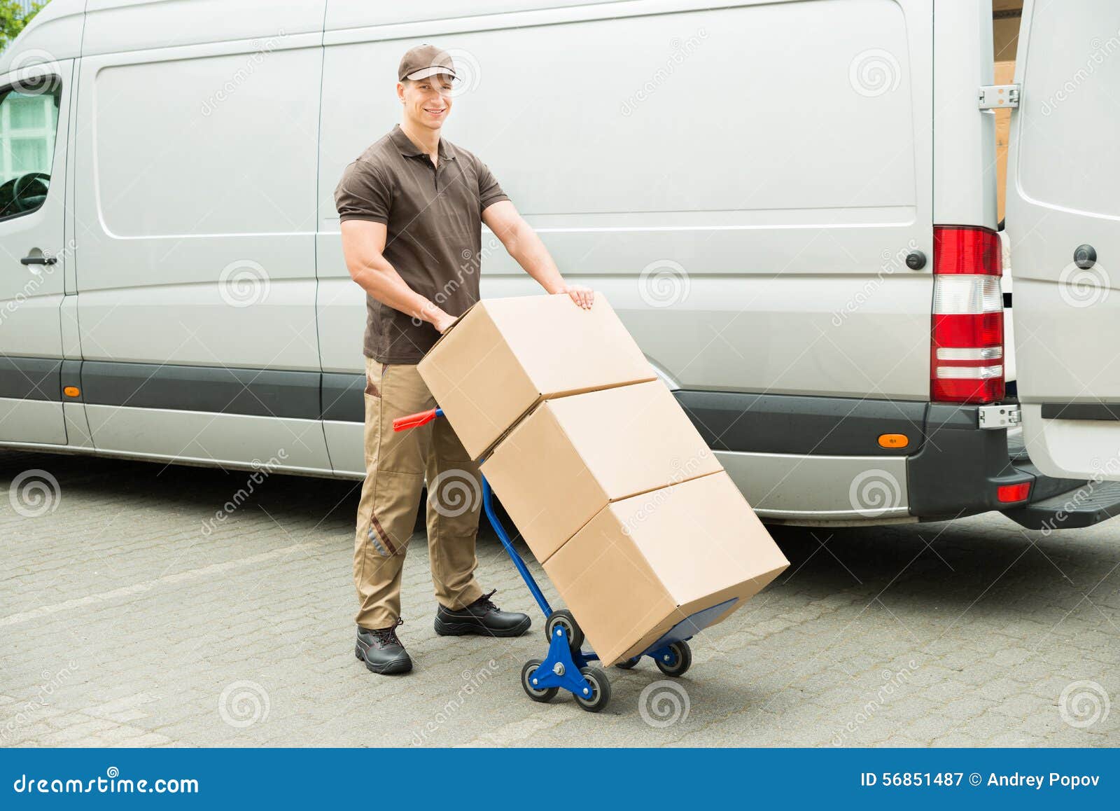 Delivery Man Holding Trolley with Cardboard Boxes Stock Image - Image ...