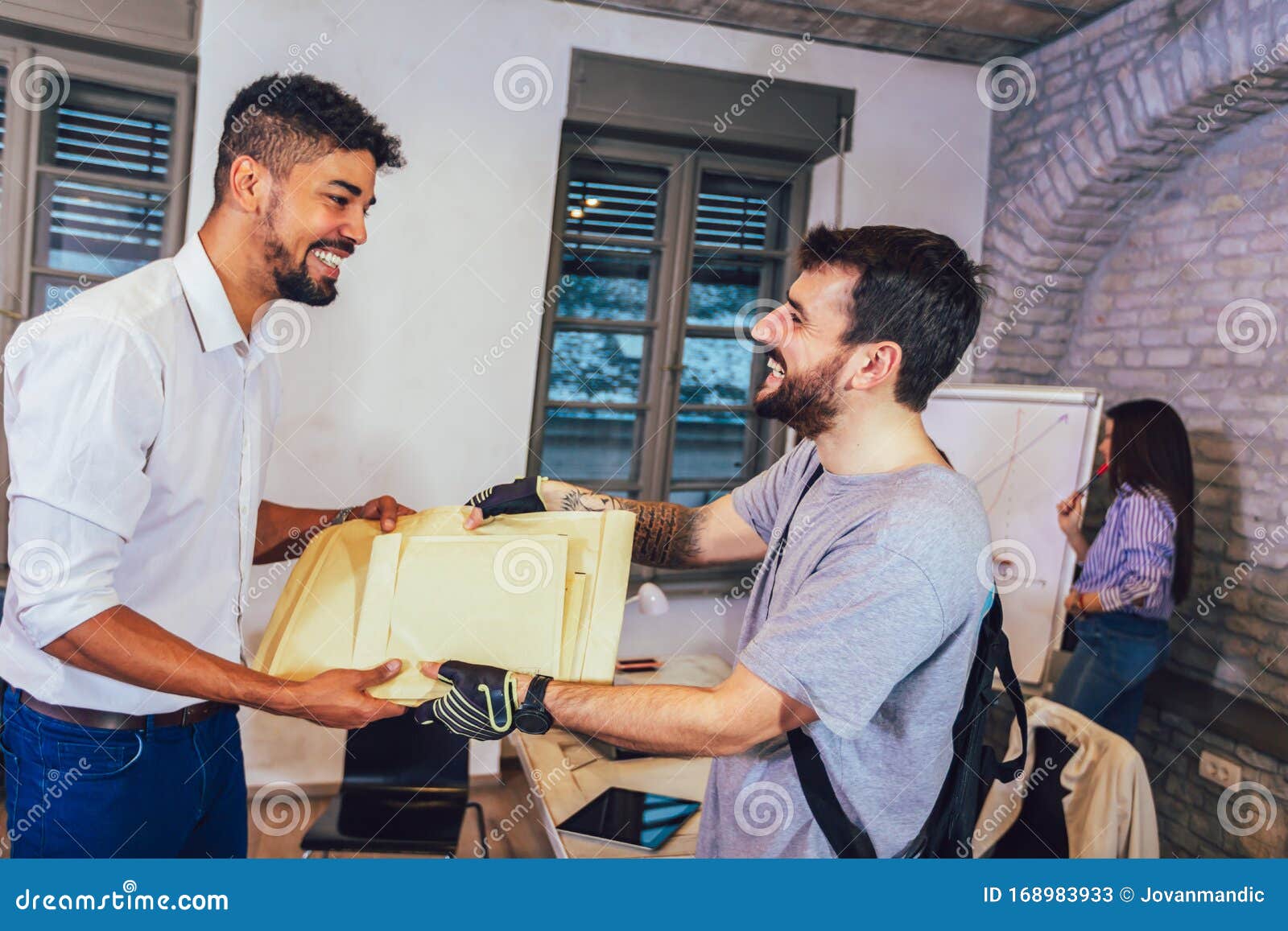 Delivery Man Package Delivery at Office Stock Image - Image of freight ...