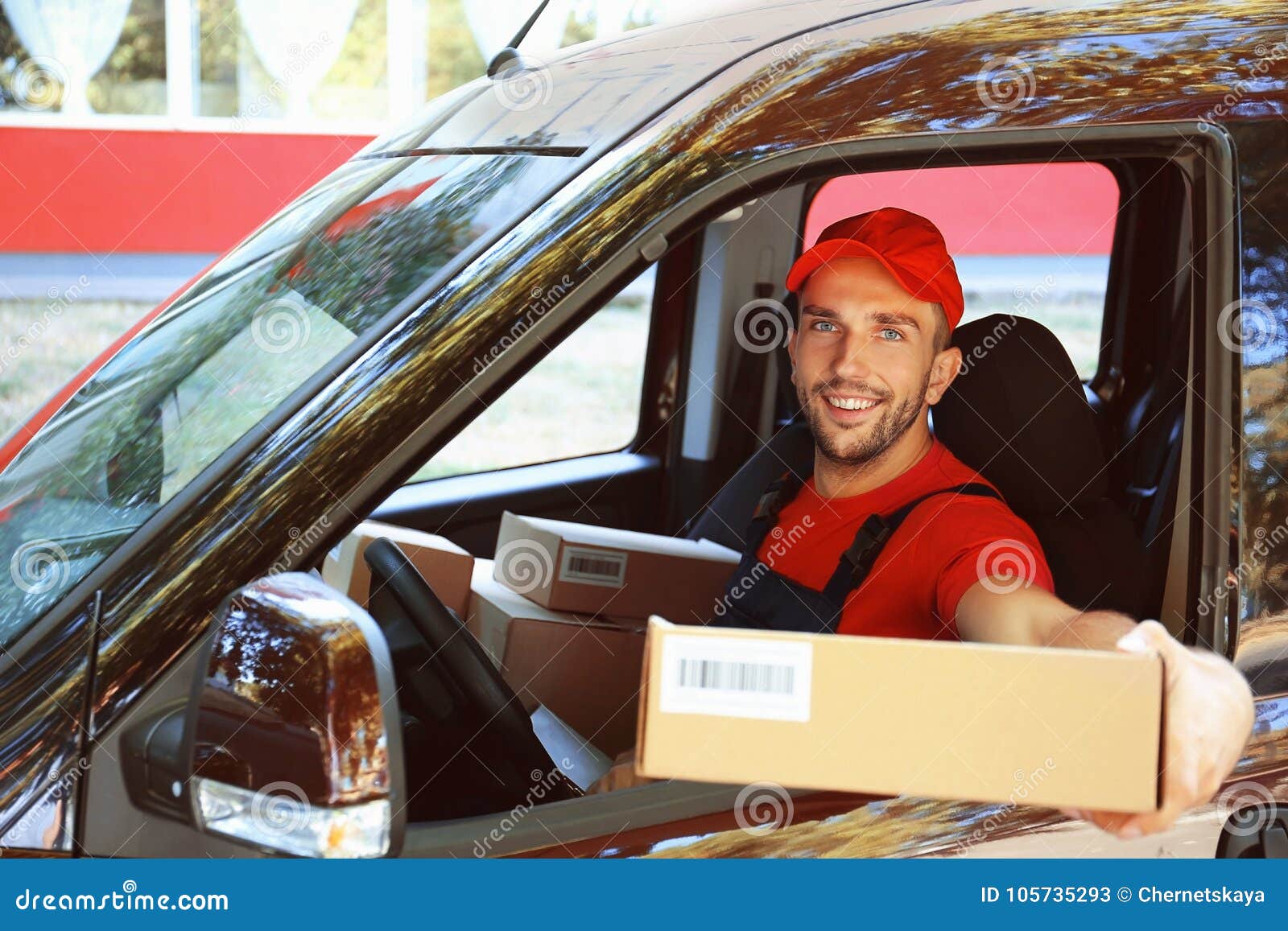 Delivery man with parcel stock image. Image of courier - 105735293