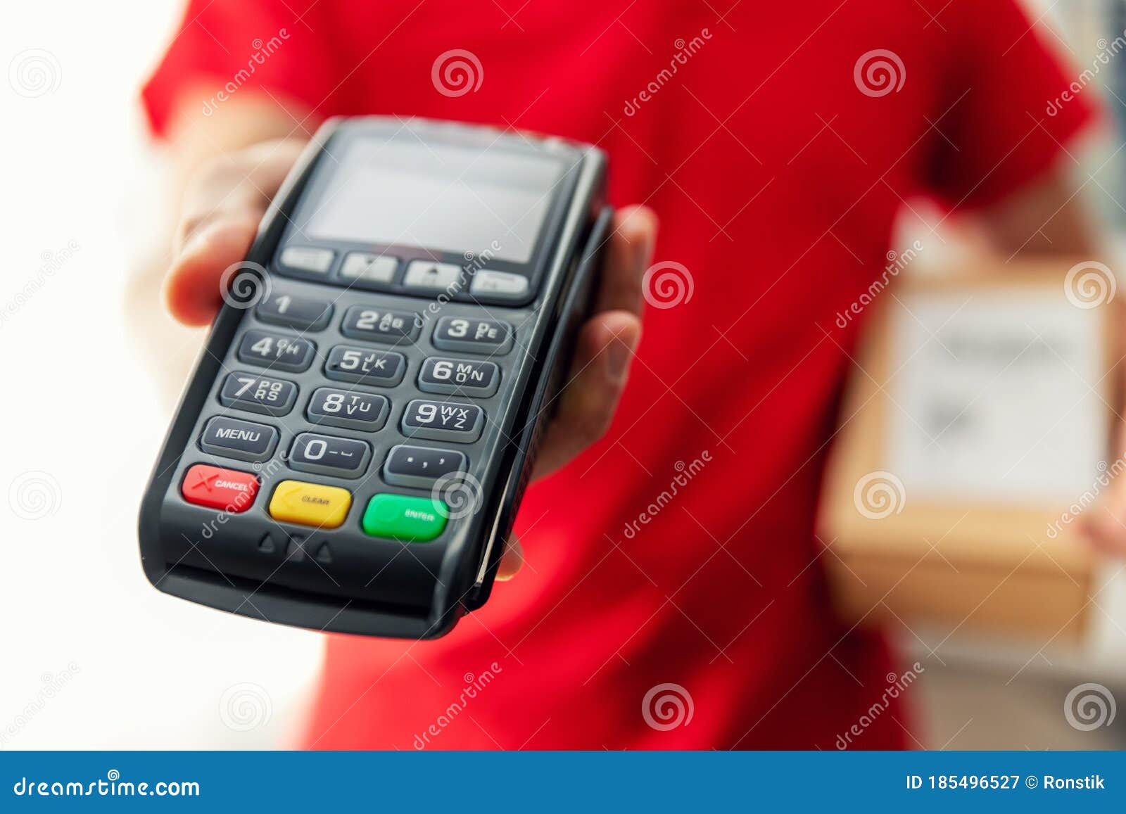 Delivery Man with Parcel and Pos Terminal for Payment Stock Image ...