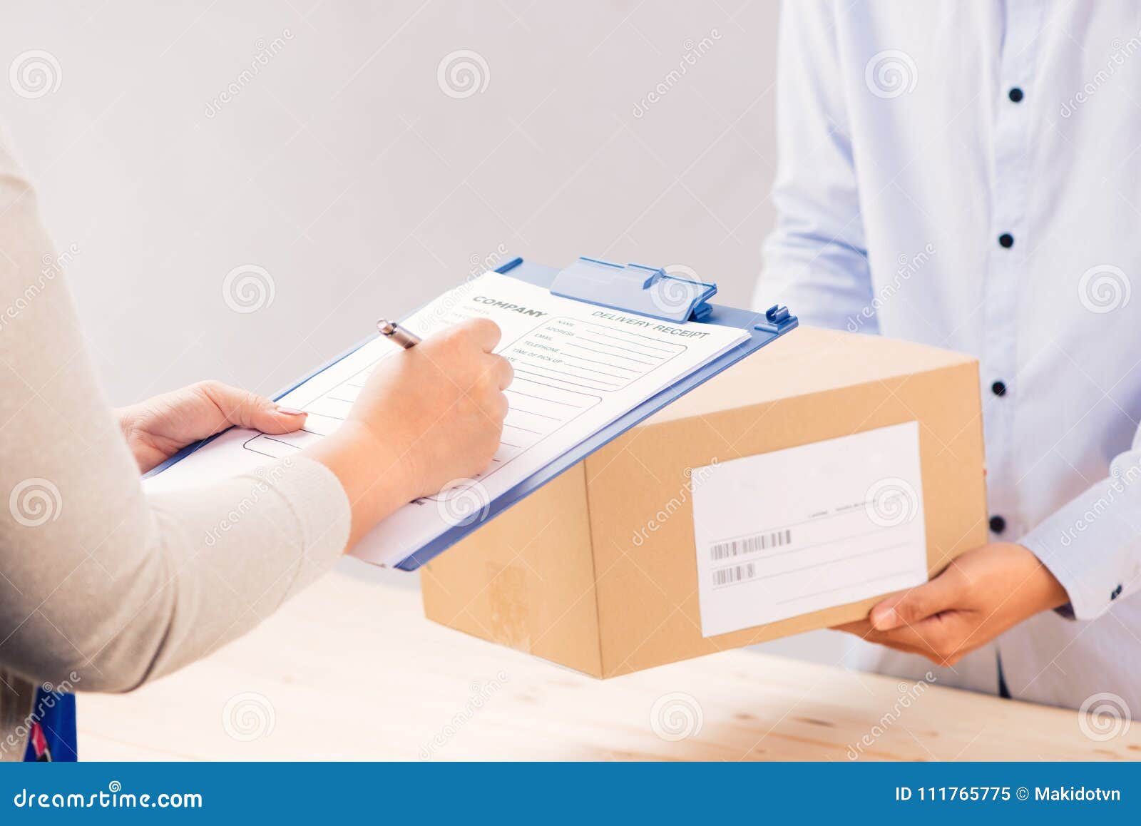 Delivery Man Presenting Receiving Form In Post Office Stock Photo ...