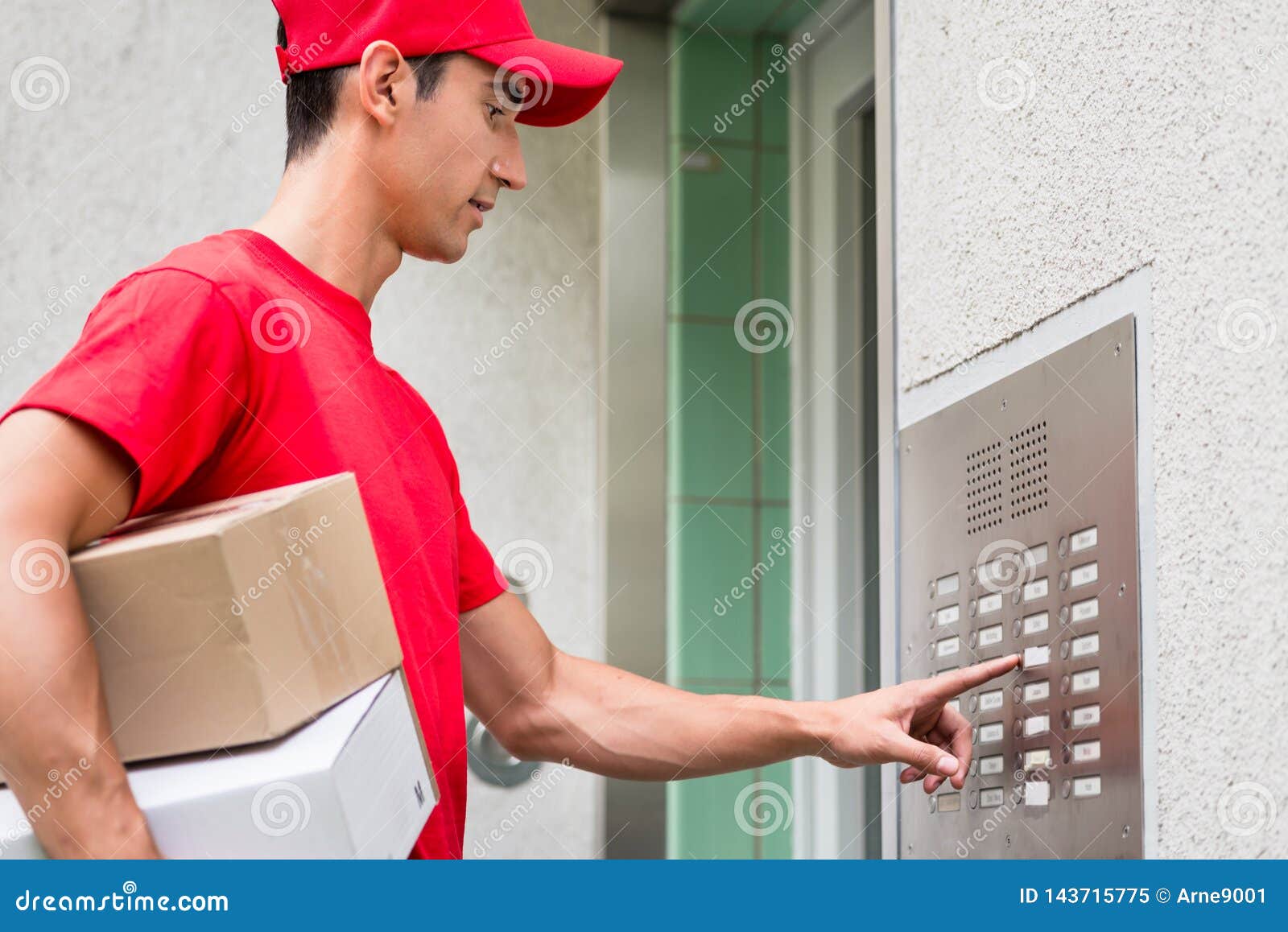Delivery Man Pressing Button of Intercom Stock Image - Image of ...