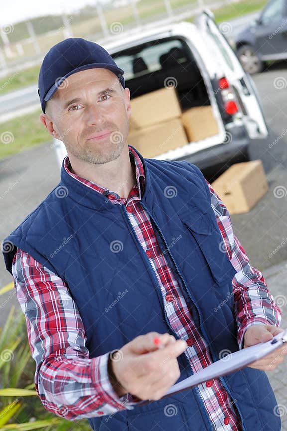 Delivery Man Requesting Signature Stock Image - Image of portrait, freight: 291572359