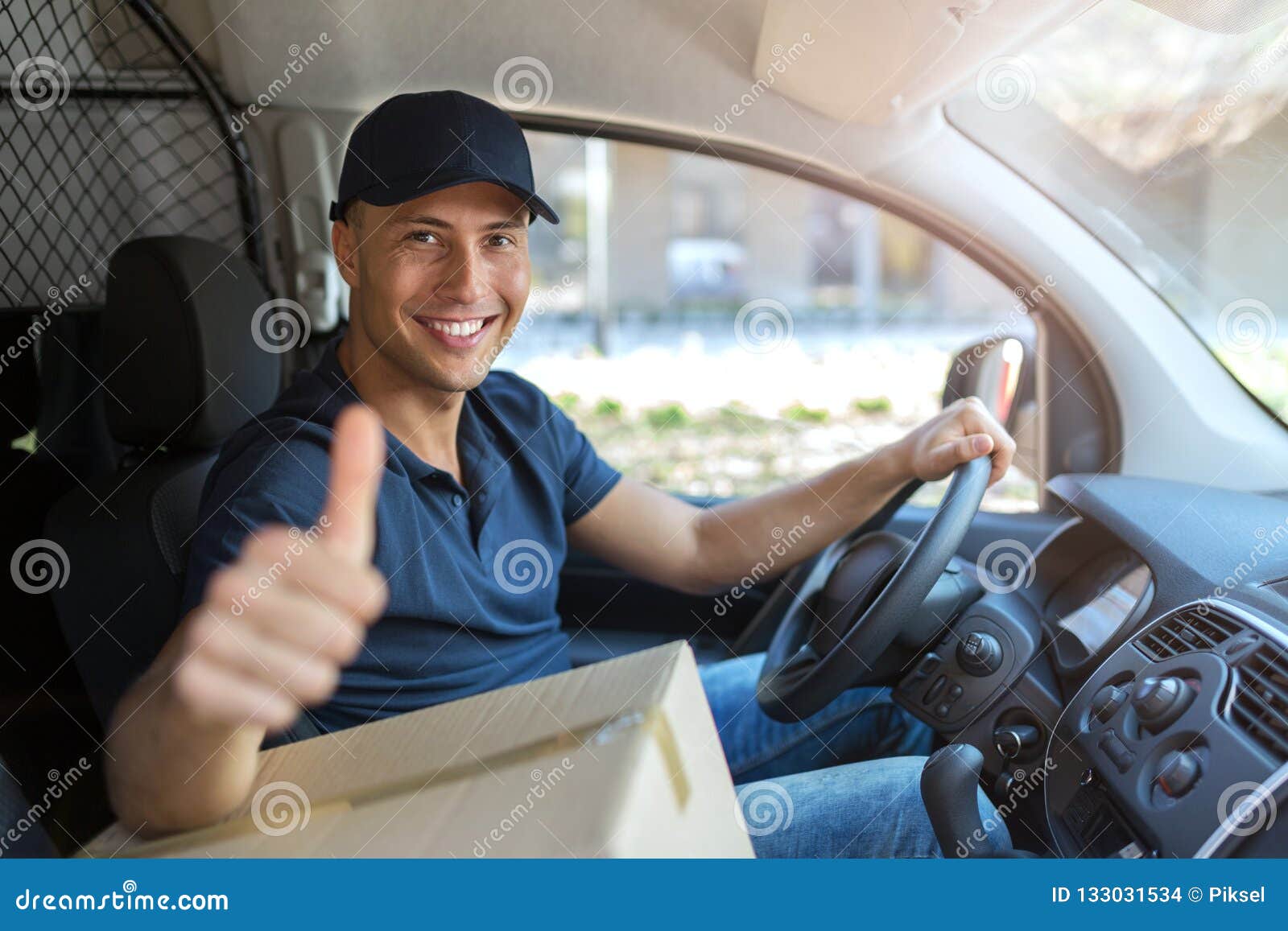 Delivery Man Sitting in a Delivery Van Stock Photo - Image of adult ...