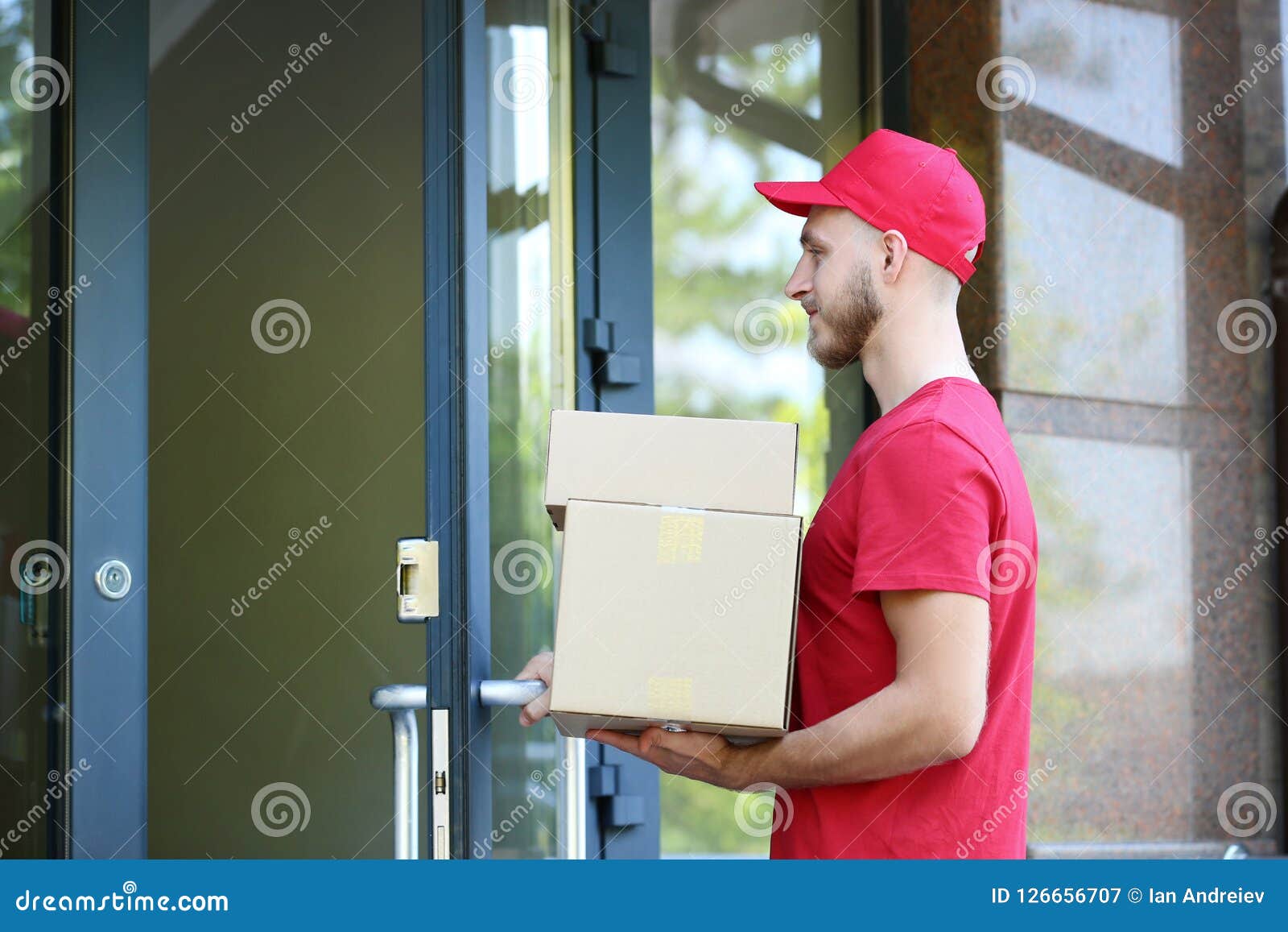 Delivery man in uniform stock image. Image of postman - 126656707