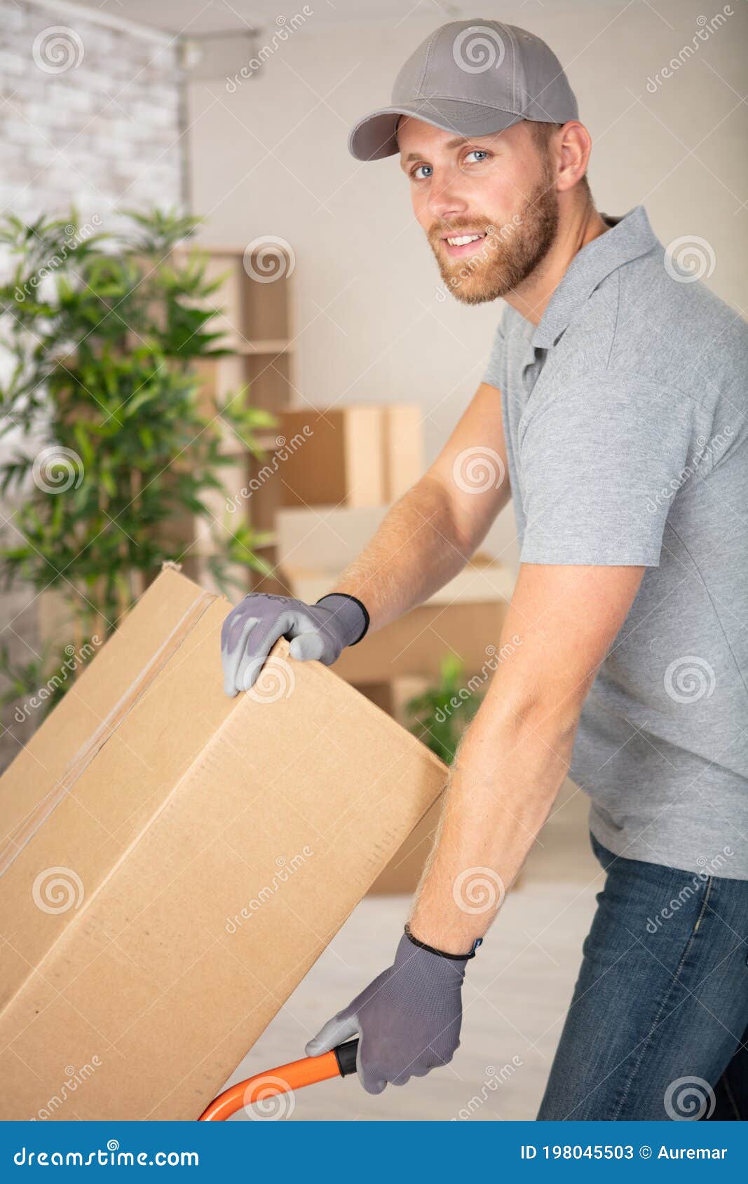 Delivery Man Uses Trolley Full Cardboard Boxes Stock Image - Image of ...