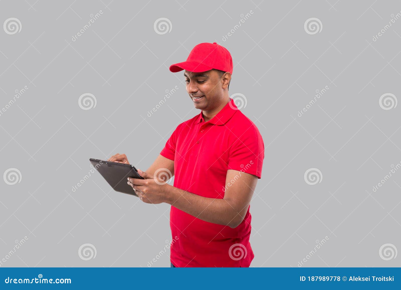 Delivery Man Using Tablet. Indian Delivery Boy with Tablet Stock Photo ...
