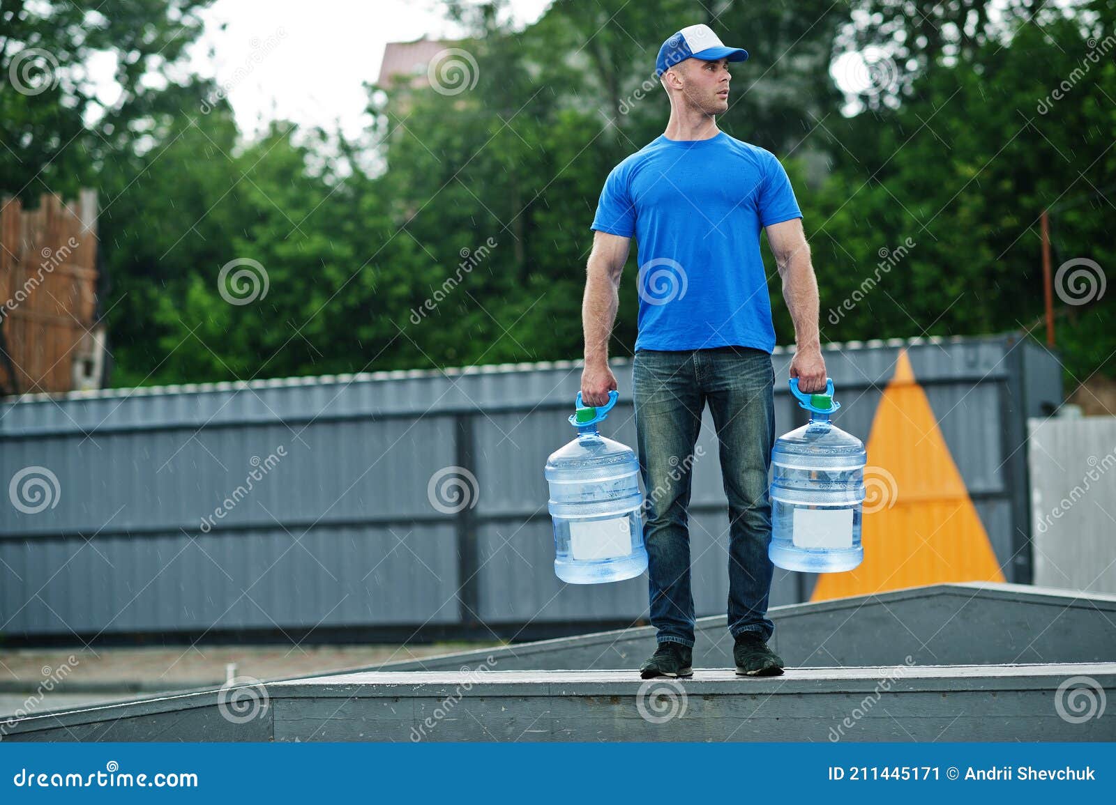 Delivery men of water stock image. Image of office, handling - 211445171