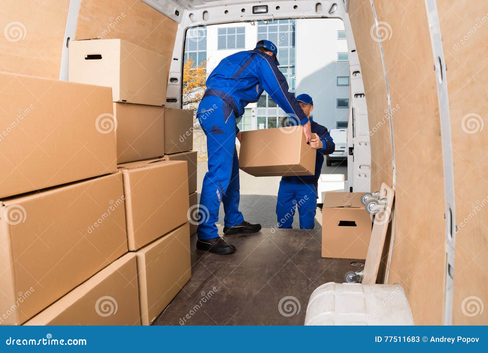 Delivery Men Loading Cardboard Boxes Stock Image - Image of deliver ...