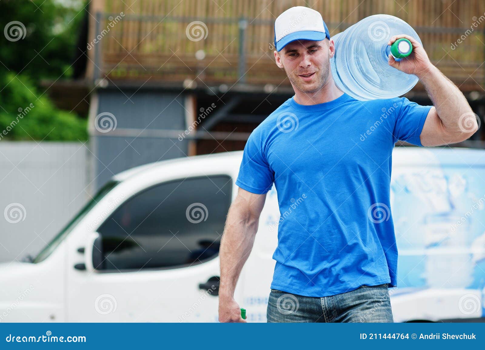 Delivery men of water stock photo. Image of truck, adult - 211444764