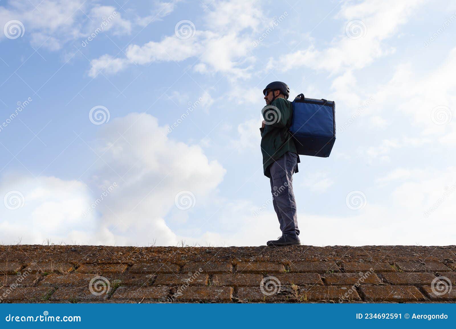 Delivery Person Standing with Box on Back Stock Image - Image of ...