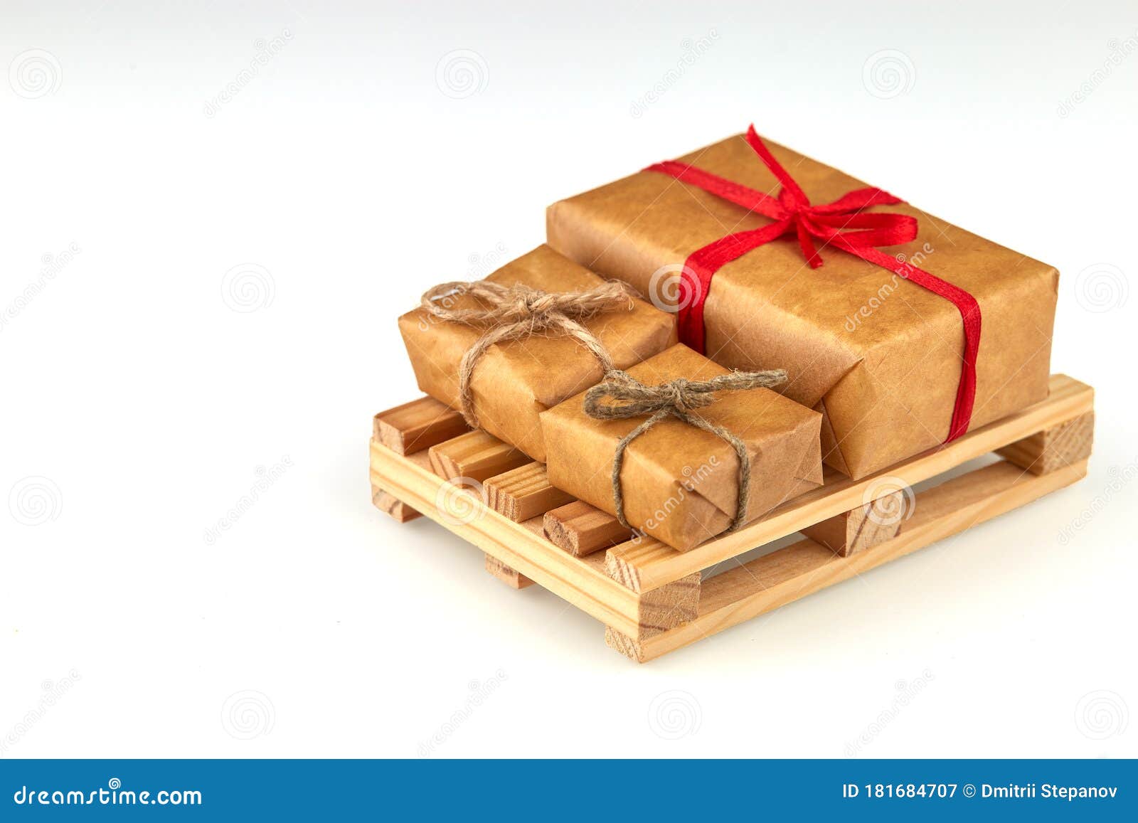 Delivery Presents in Three Boxes with Red Ribbon on Pallet for Goods ...