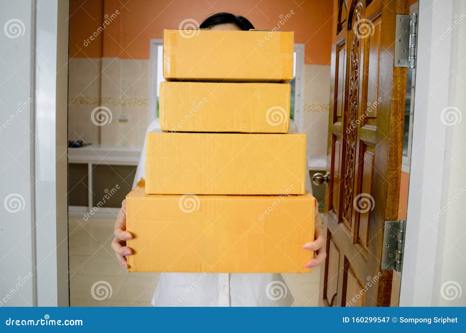 Delivery Staff Uniform Handing a Parcel Box Receiving Parcel Stock ...