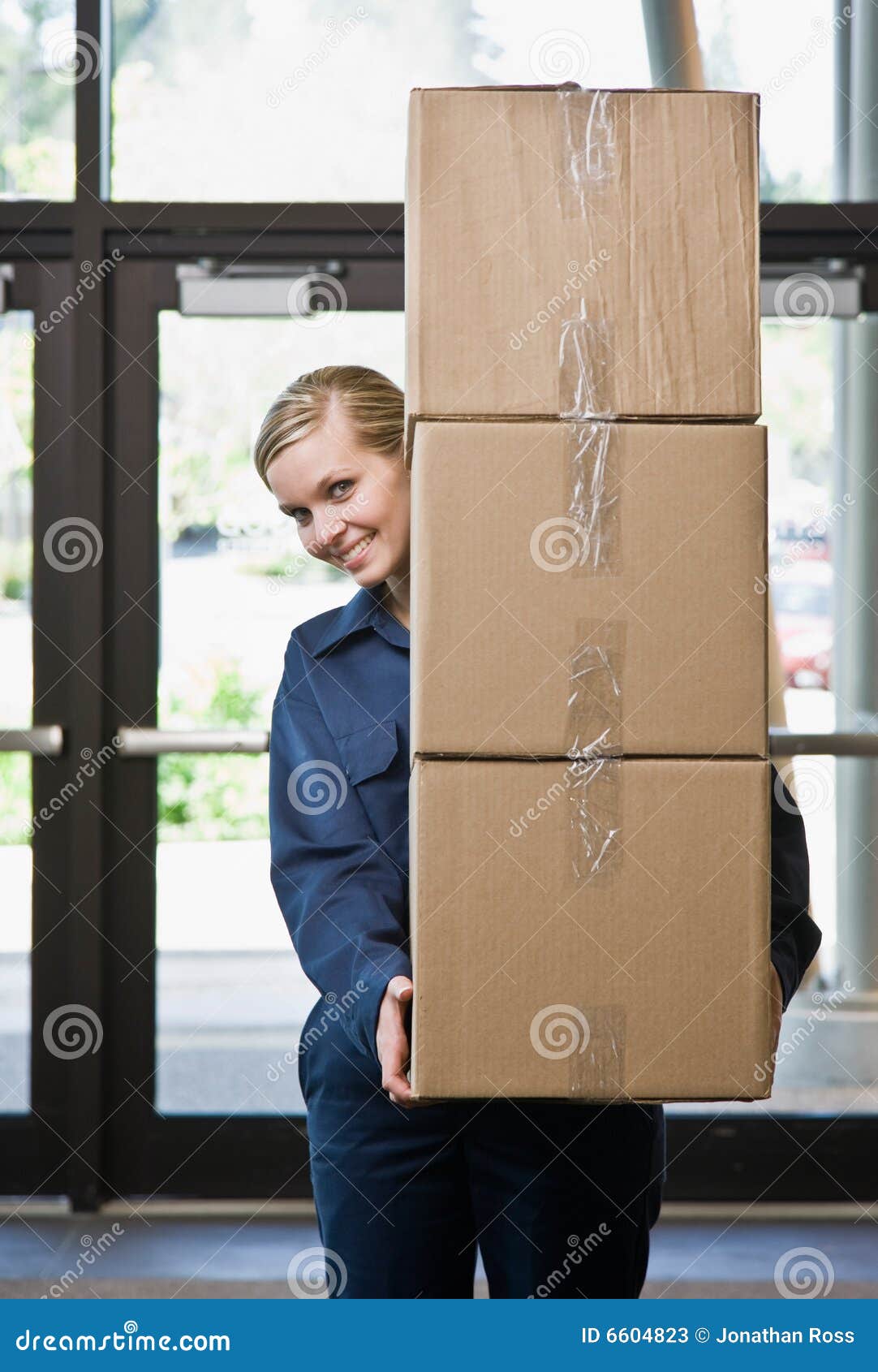 Delivery Woman Carefully Carrying Stack of Boxes Stock Image - Image of ...