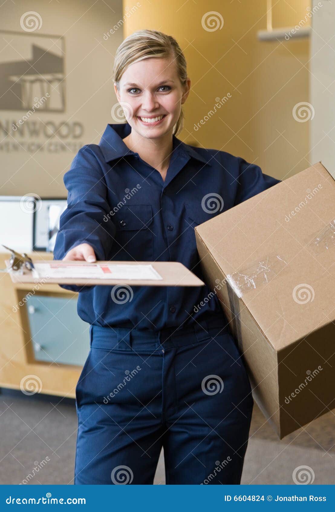 Delivery Woman Presenting Shipping Receipt Stock Photo - Image of ...