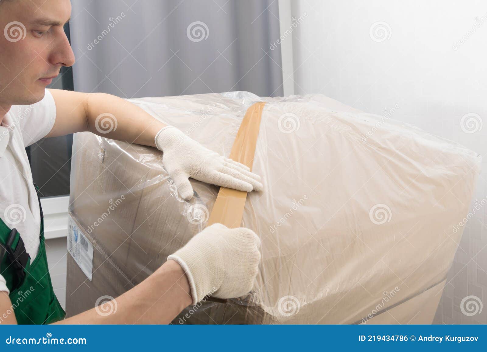 Delivery Worker Packs the Item before Shipping Stock Photo - Image of ...