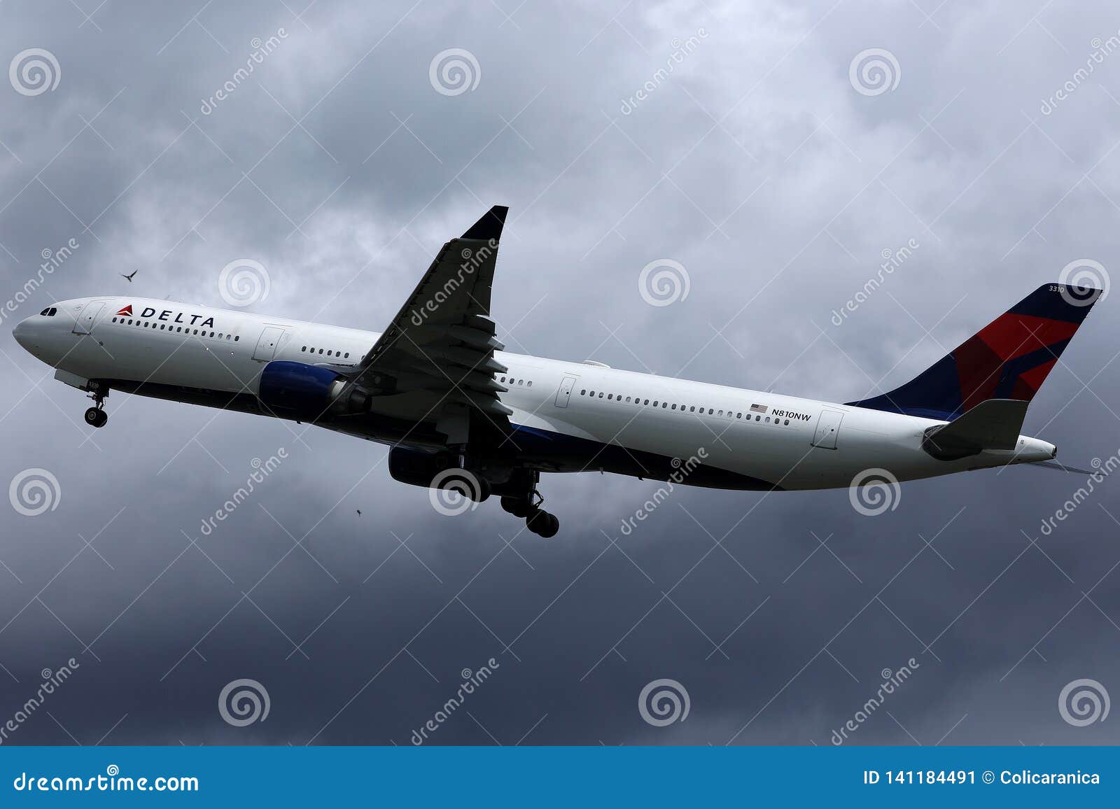 Delta Airlines Plane Flying, Blue Sky with Clouds Editorial Photo ...