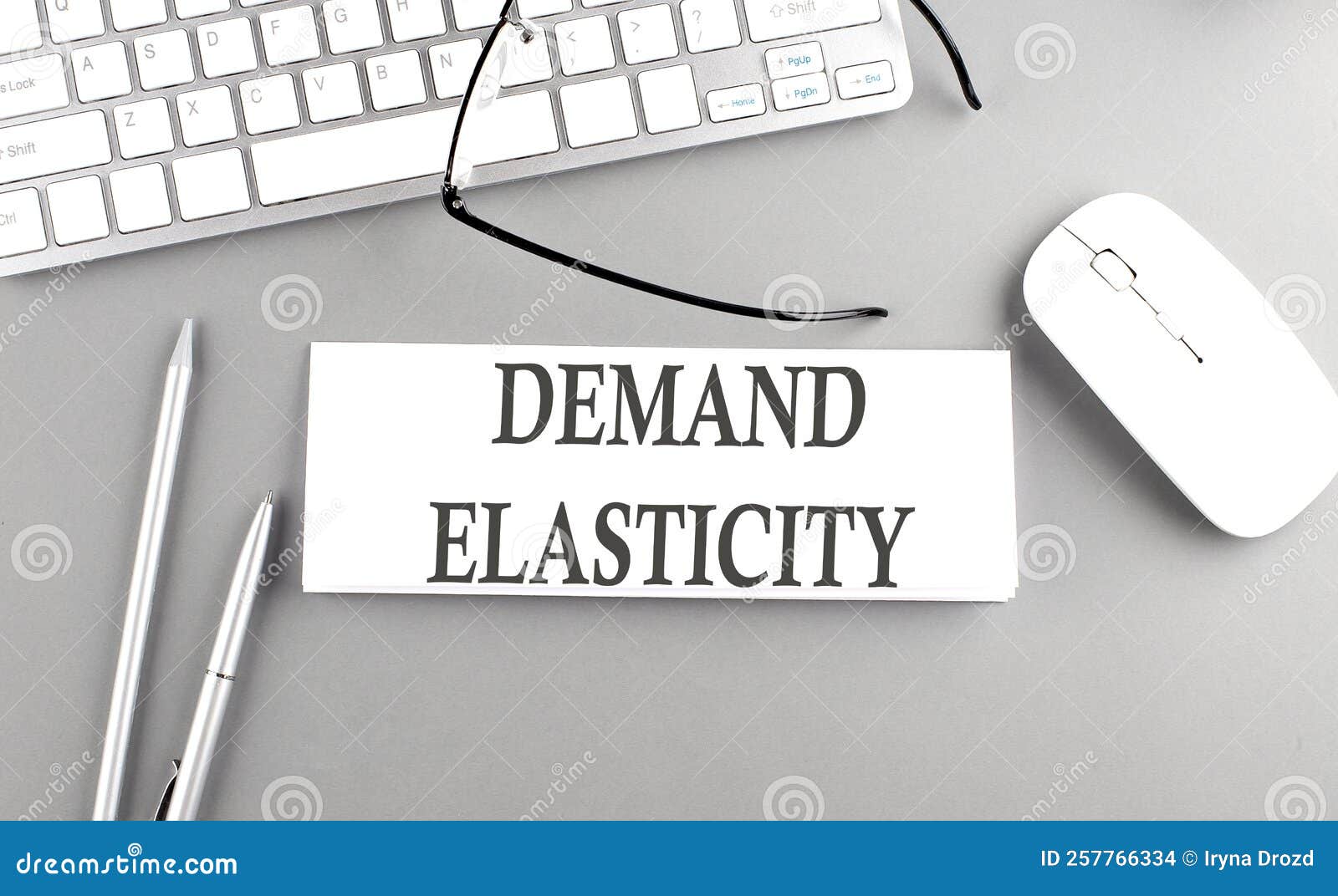 DEMAND ELASTICITY Text on Paper with Keyboard on Grey Background Stock ...