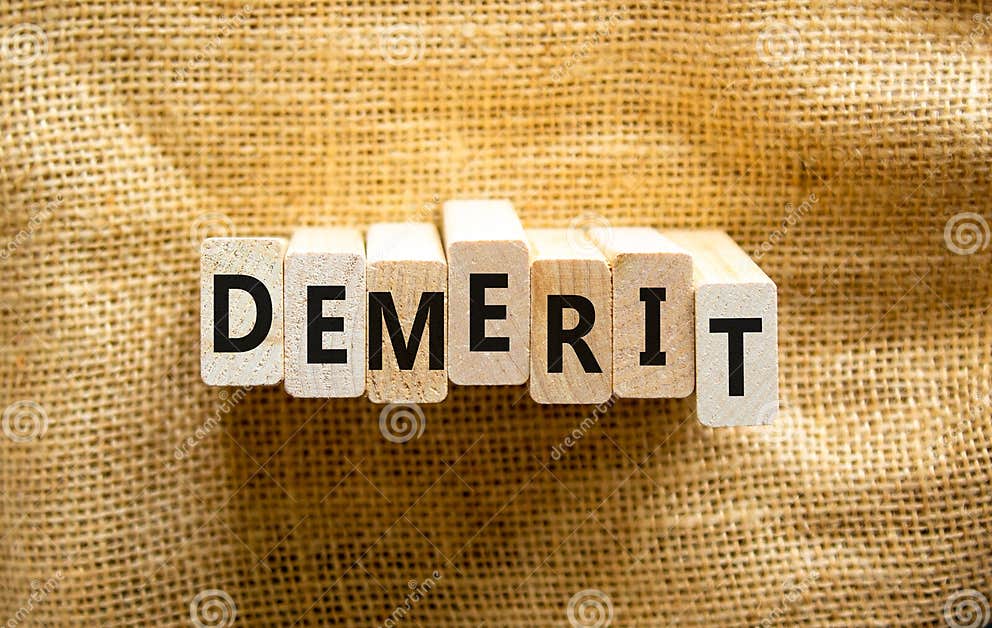 Demerit Symbol. the Concept Word Demerit on Wooden Blocks. Beautiful ...