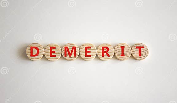 Demerit Symbol. the Concept Word Demerit on Wooden Circles. Beautiful ...