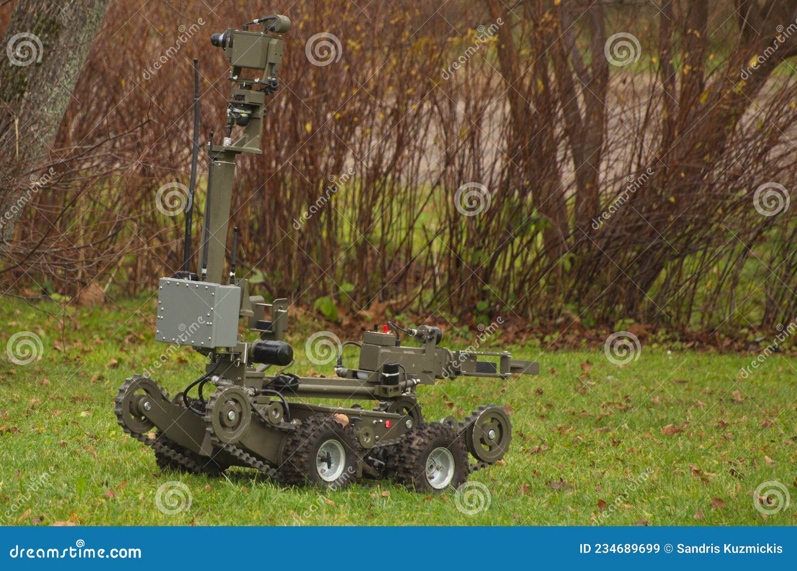 The Demining Robot is Driving through the Grass Stock Image - Image of ...