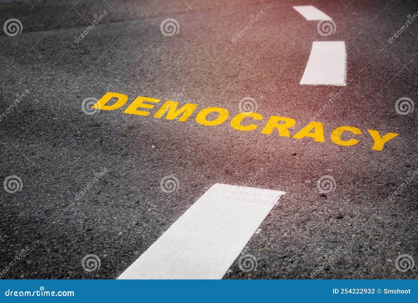 Democracy Written on Asphalt Road Stock Photo - Image of liberate ...