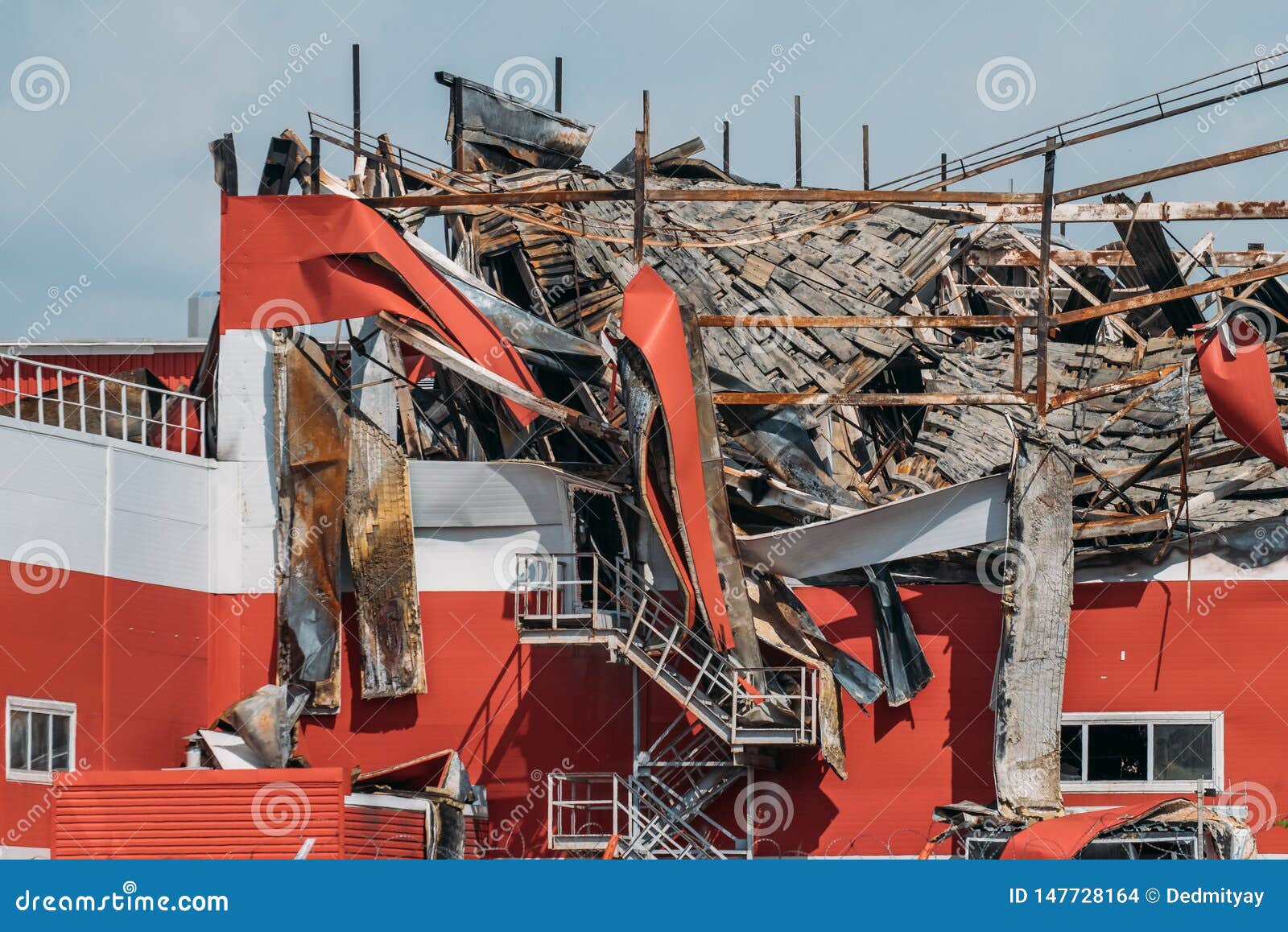 Demolished Industrial Building after Fire with Broken Roof, Walls and ... Demolished Industrial Building after Fire with Broken Roof, Walls and ...