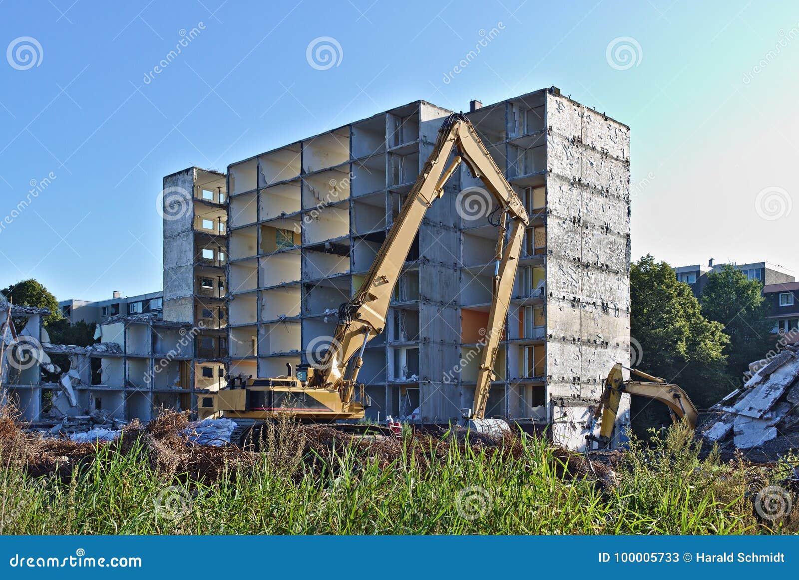 Demolished Residential Building Being Torn Down by Two Excavators Stock ...