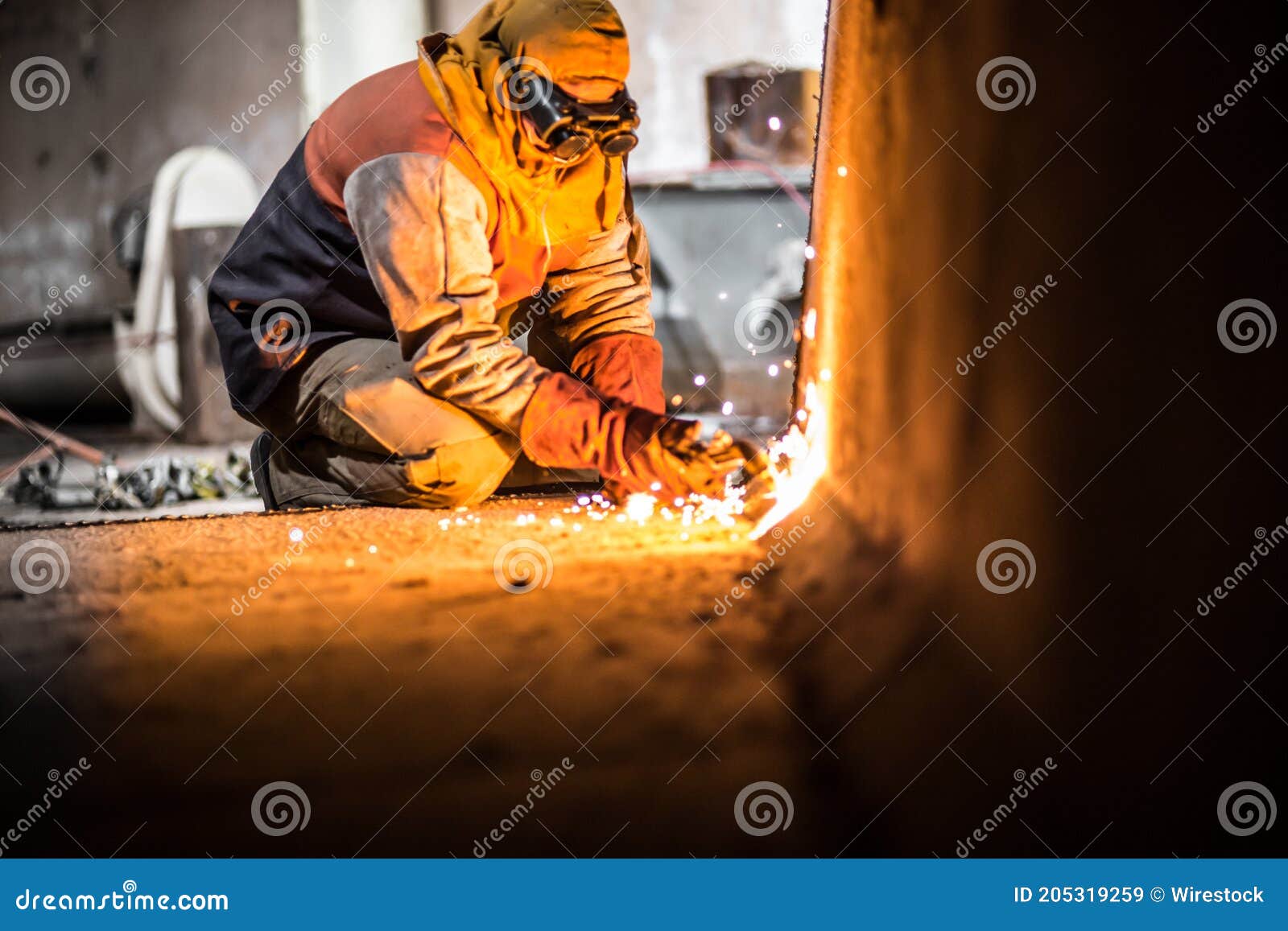 Demolition Construction Worker Using a Flame Torch To Cut Up Heavy ...