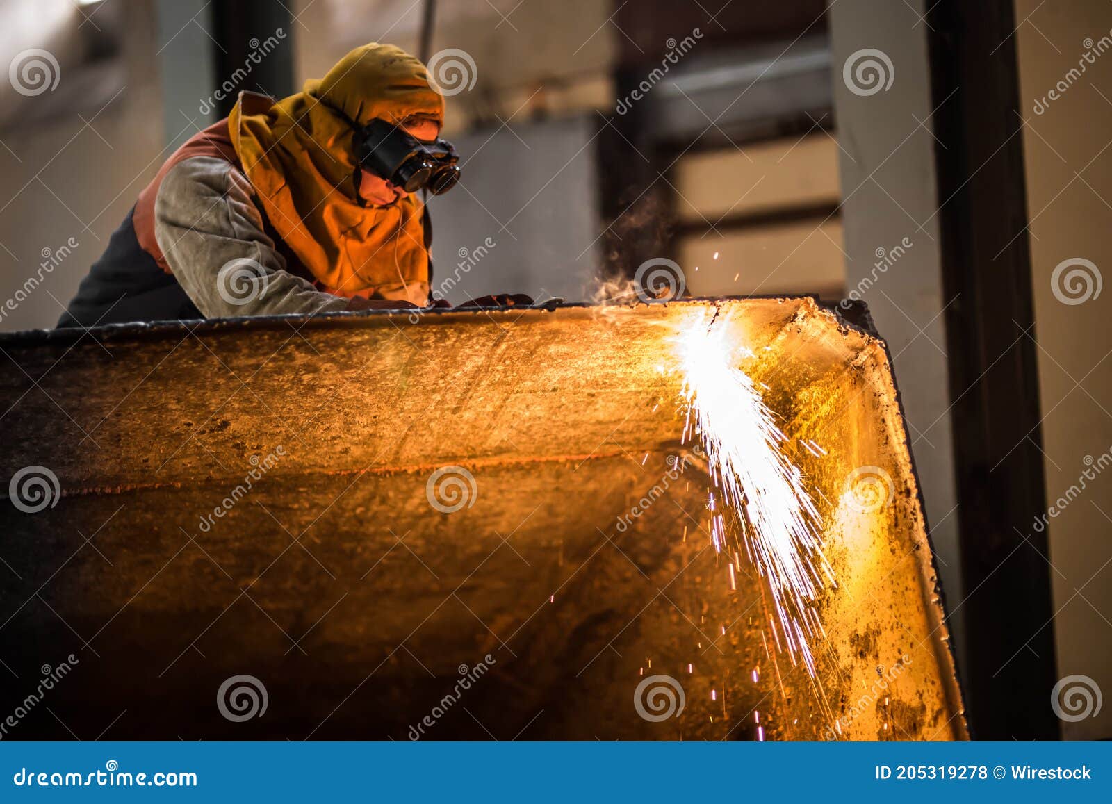 Demolition Construction Worker Using a Flame Torch To Cut Up Heavy ...