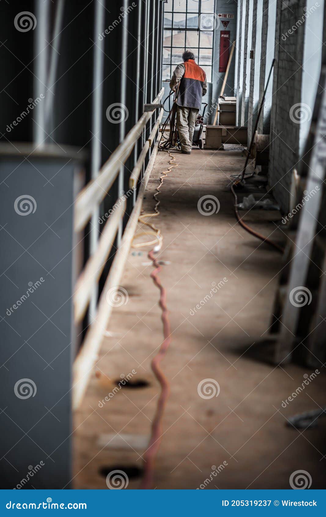 Demolition Construction Worker Using a Flame Torch To Cut Up Heavy ...