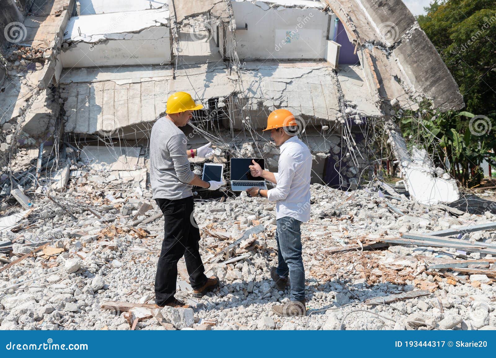 Demolition Control Supervisor and Contractor Discussing on Demolish ...