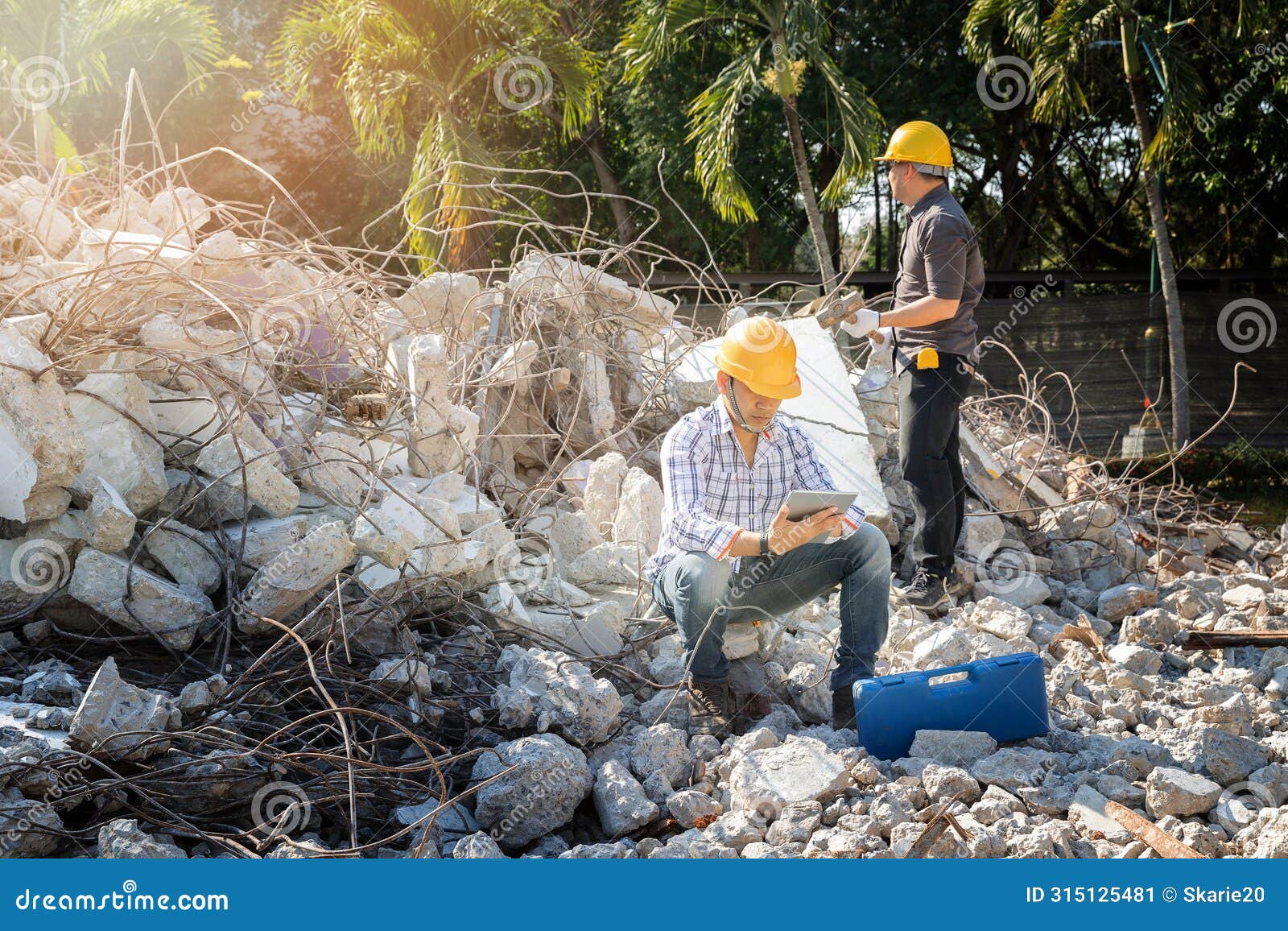 Demolition Control Supervisor and Contractor Working on Demolish ...