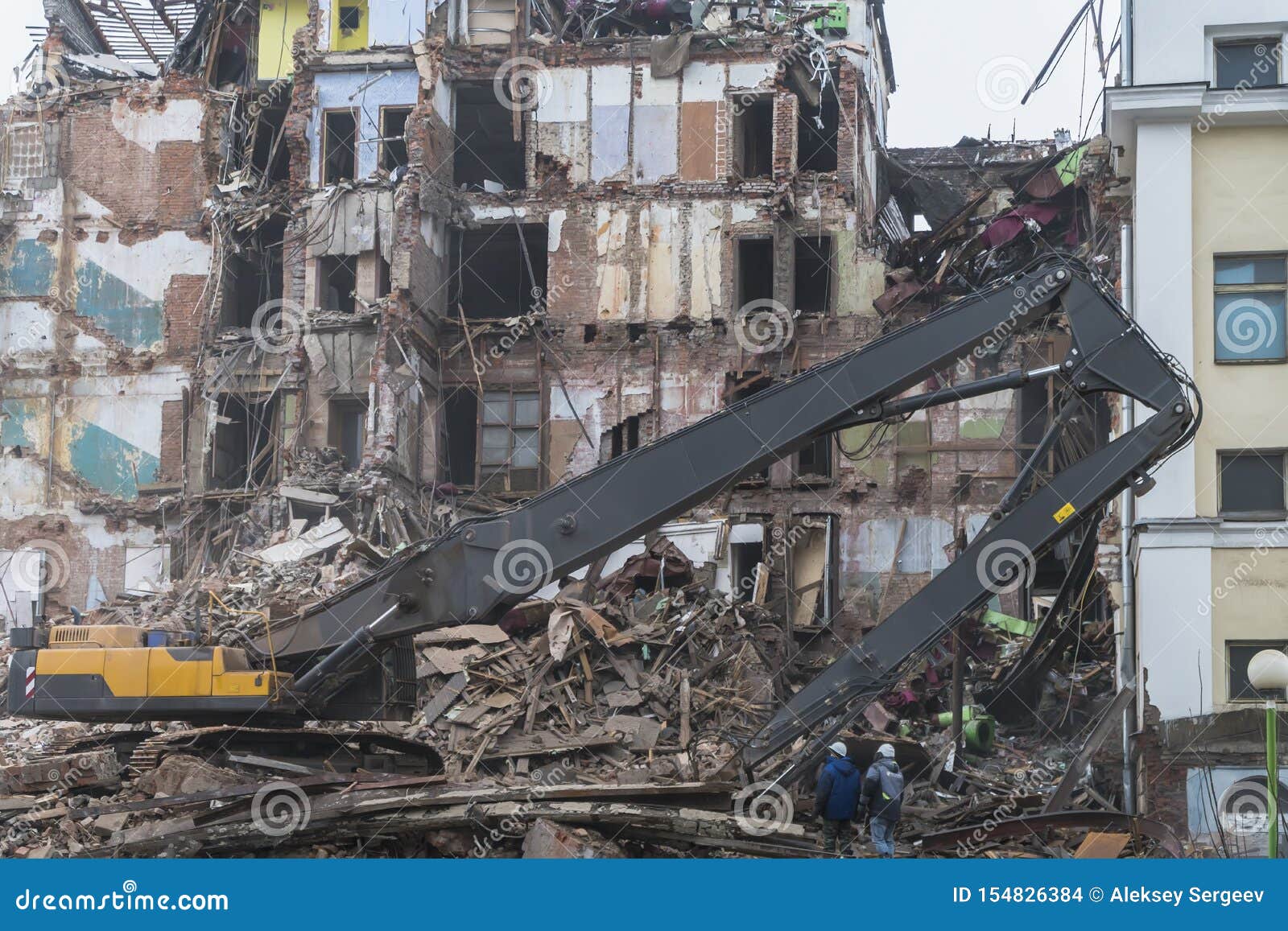 Demolition of a Multi-storey Building with Hydraulic Shears, for Future ...