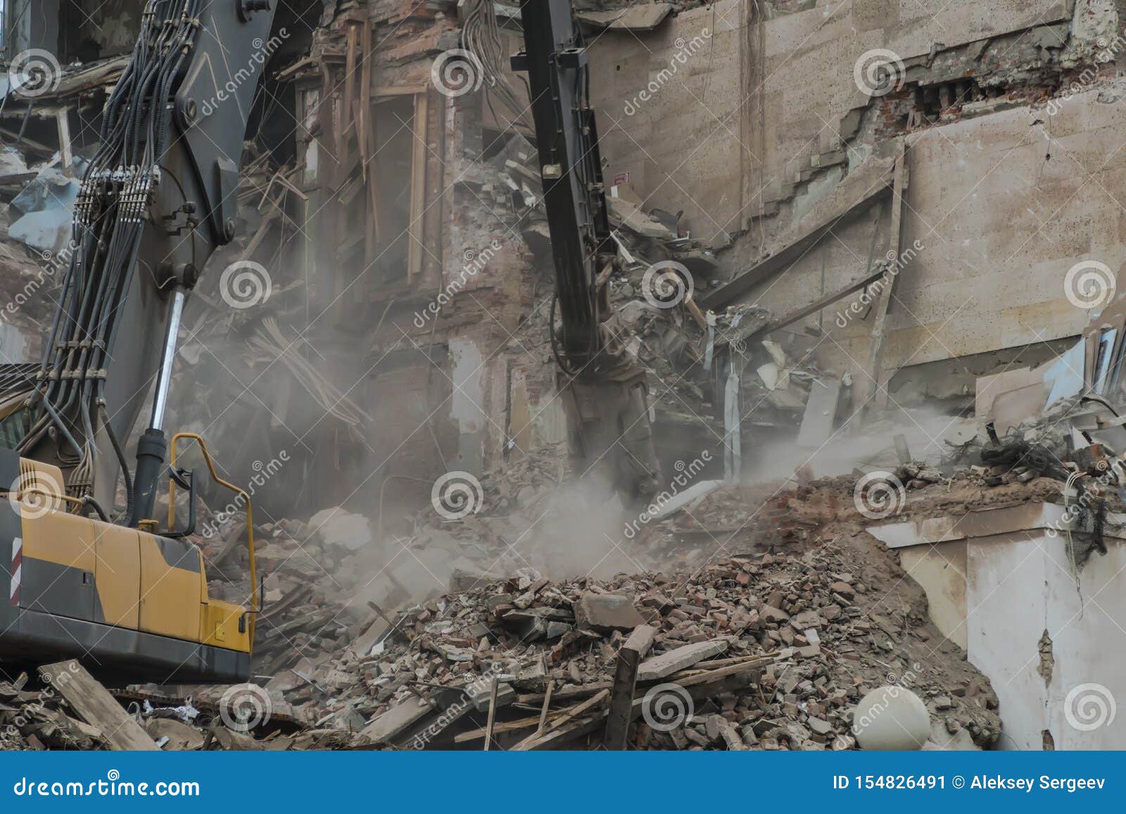 Demolition of a Multi-storey Building with Hydraulic Shears, for Future ...