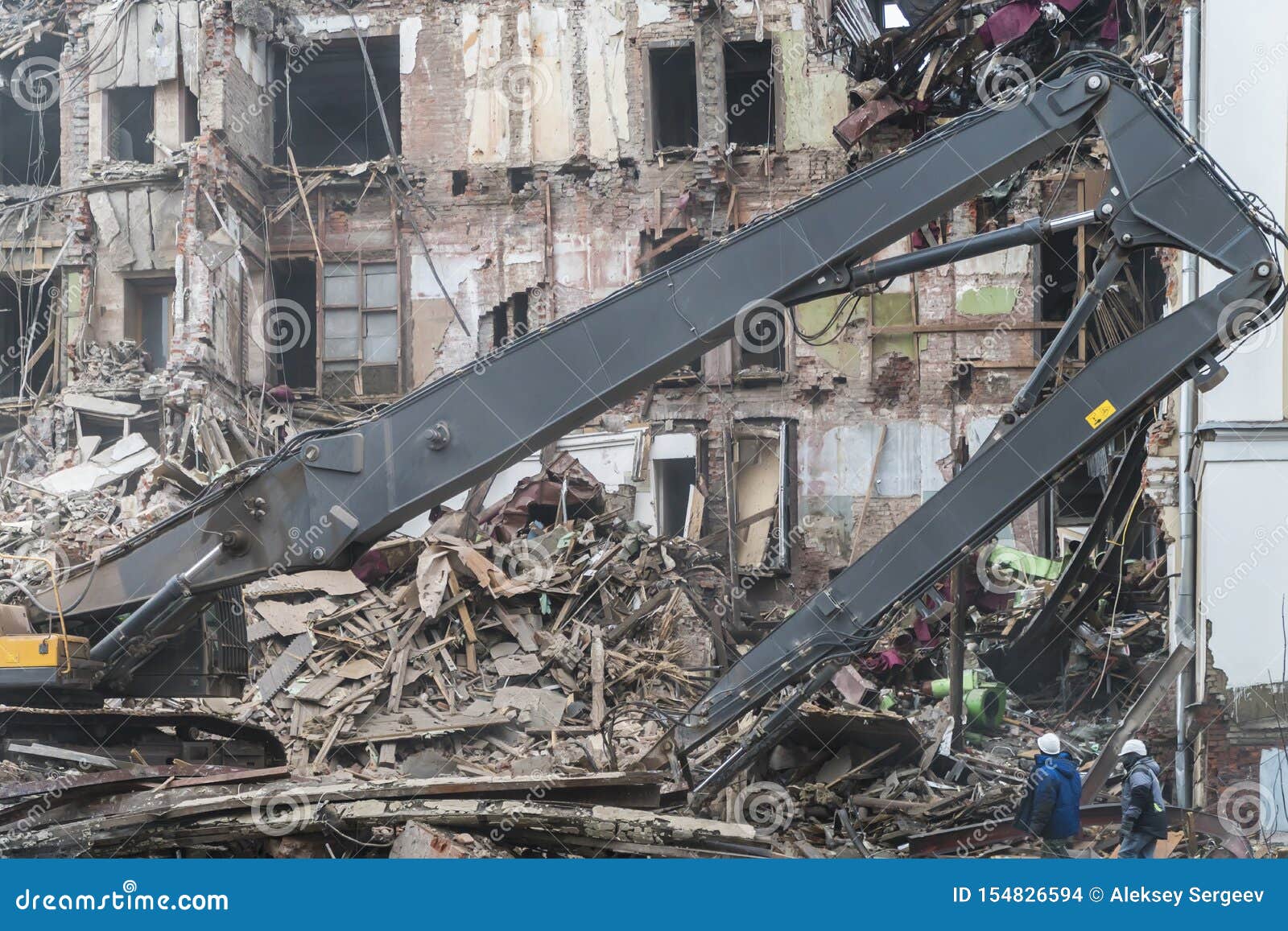 Demolition of a Multi-storey Building with Hydraulic Shears, for Future ...
