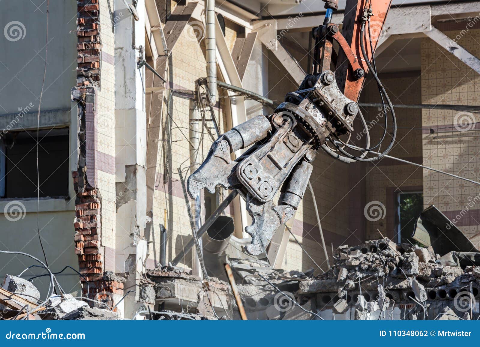 Demolition of Old Industrial Building Using Hydraulic Jaws Stock Photo ...