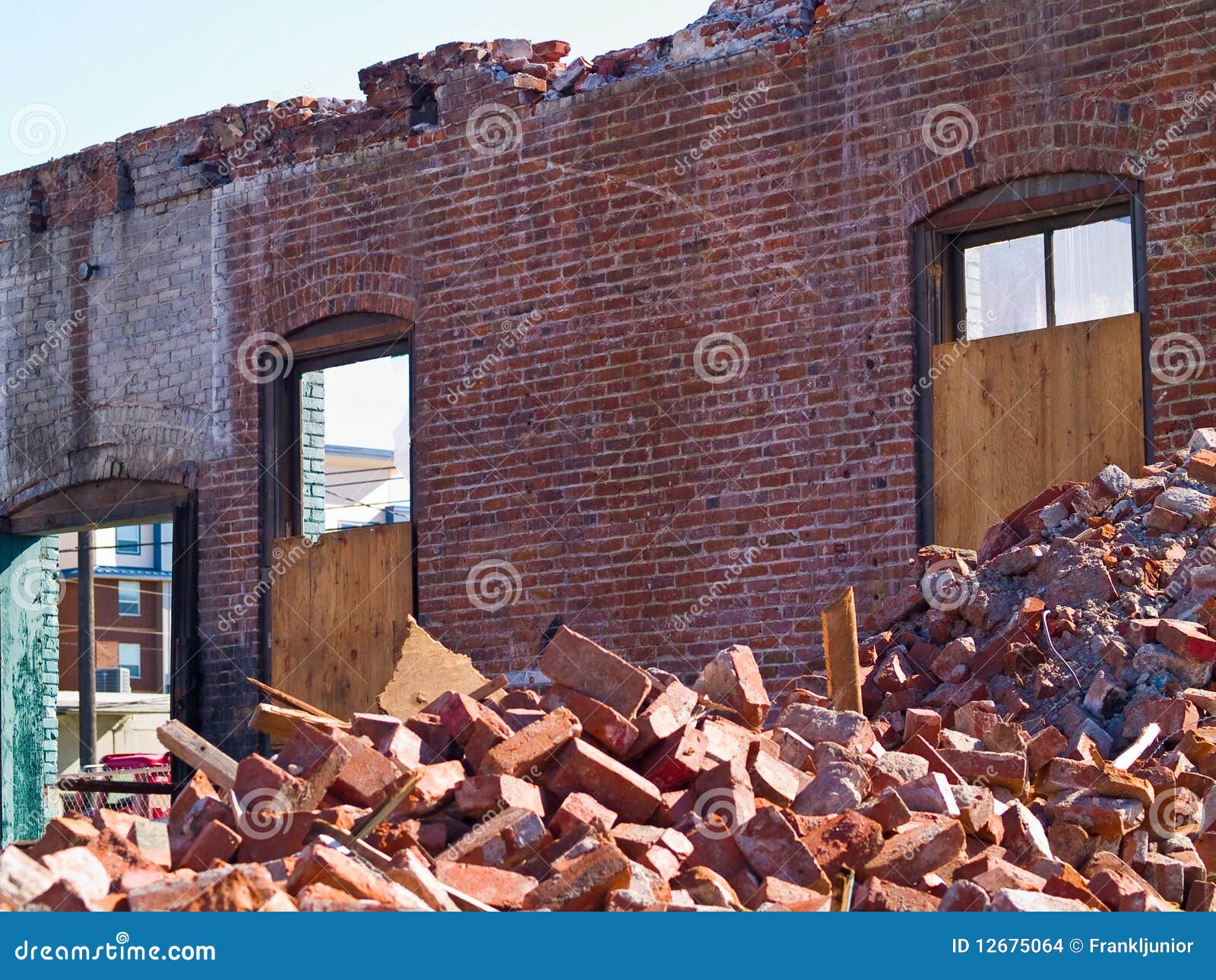 Demolition Site Top View. Heavy Excavator Loading A Debris And Rubble ...